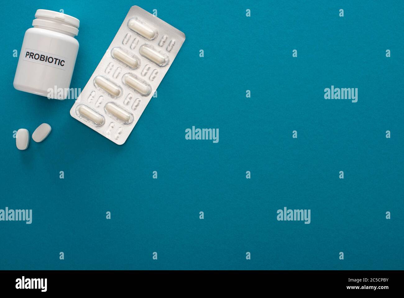 top view of container with probiotic lettering, pills and blister pack ...