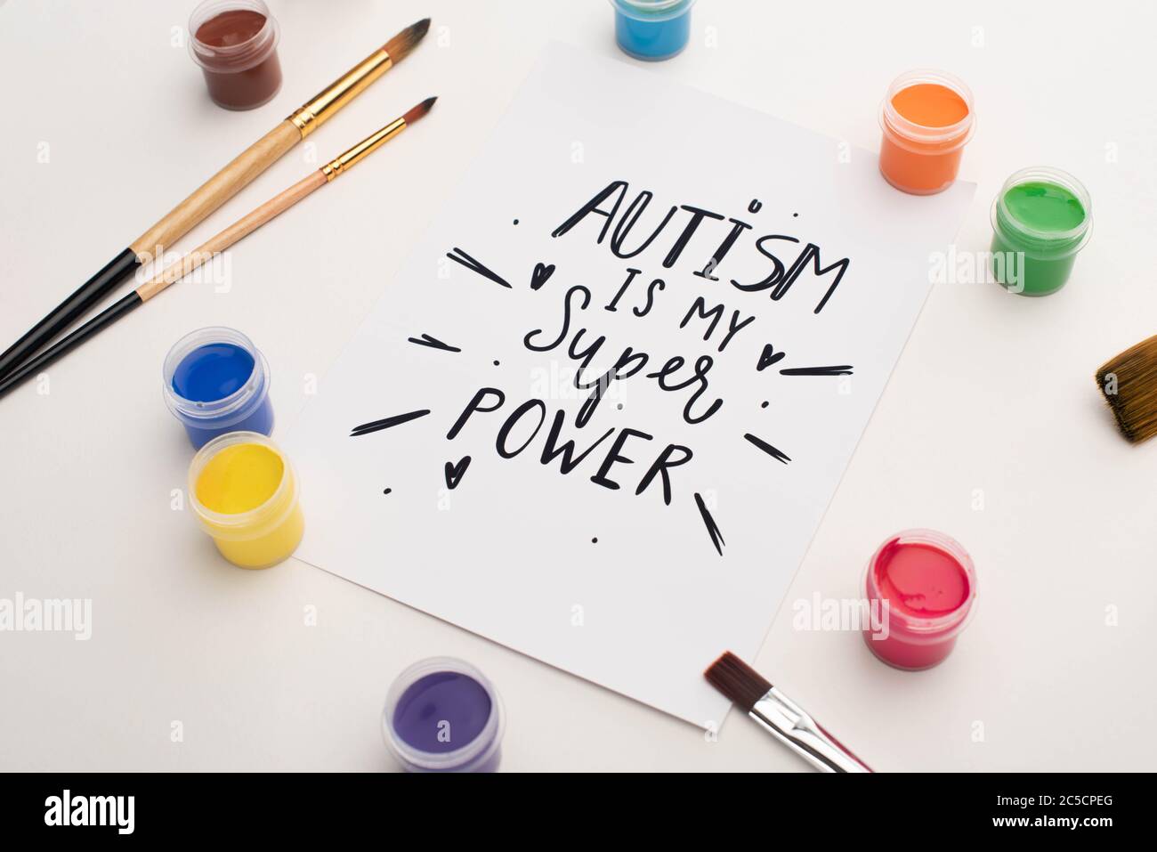 paints, brushes and card with autism is my super power lettering on ...