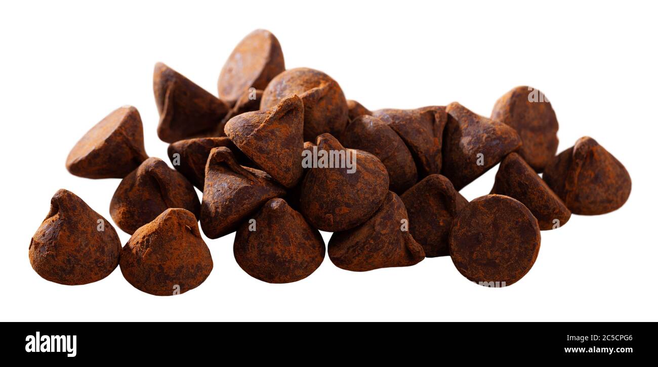 Dessert truffles sprinkled with cocoa. Isolated over white background ...
