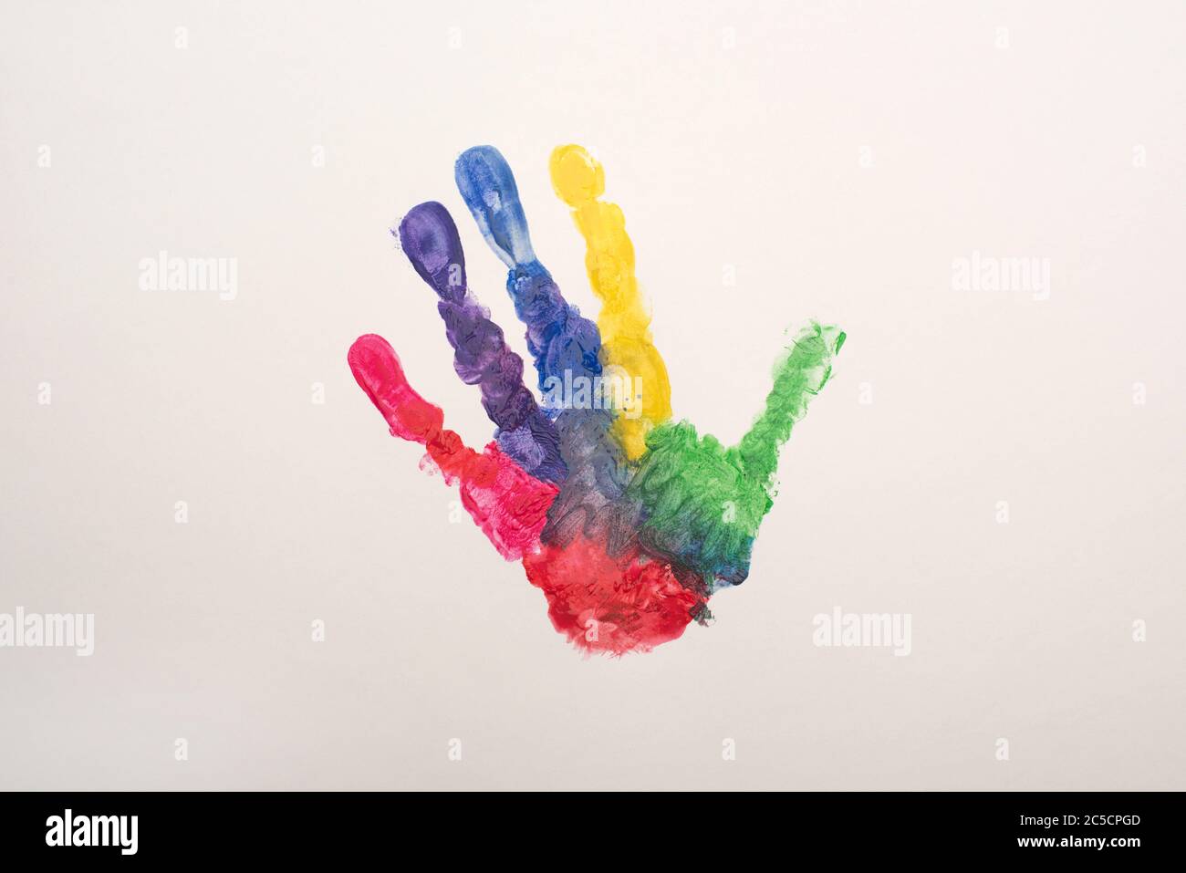 top view of colorful handprint on white for World Autism Awareness Day ...