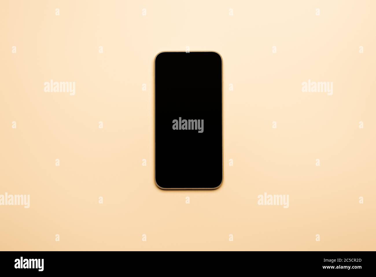 top view of smartphone with blank screen on beige Stock Photo - Alamy