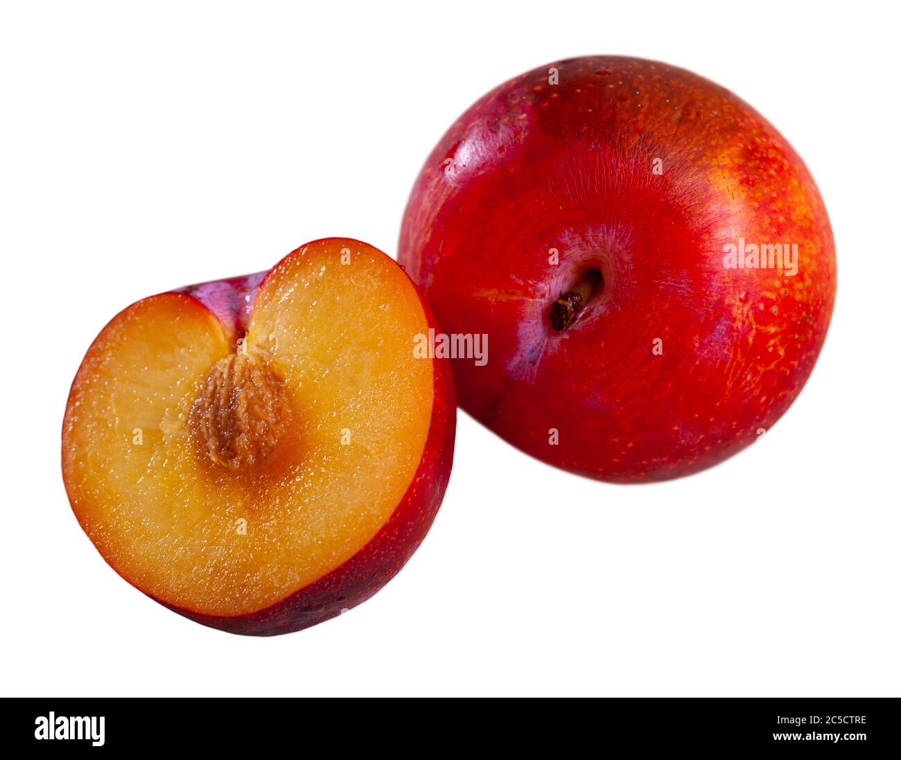 Sliced fresh juicy red plums. Concept of health benefits of fruits ...