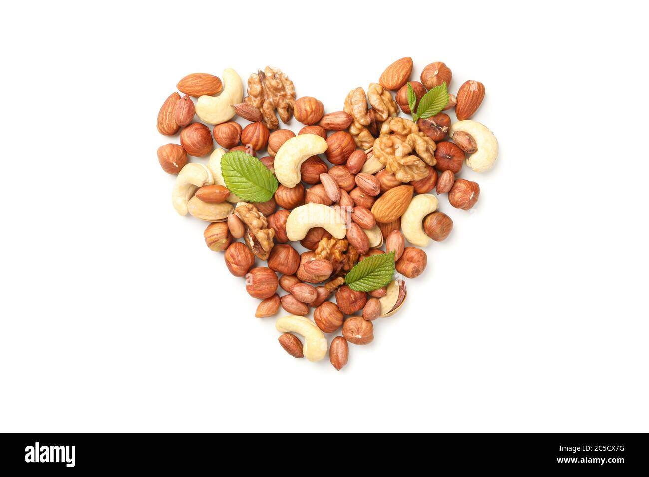 Heart made of different nuts isolated on white background Stock Photo ...