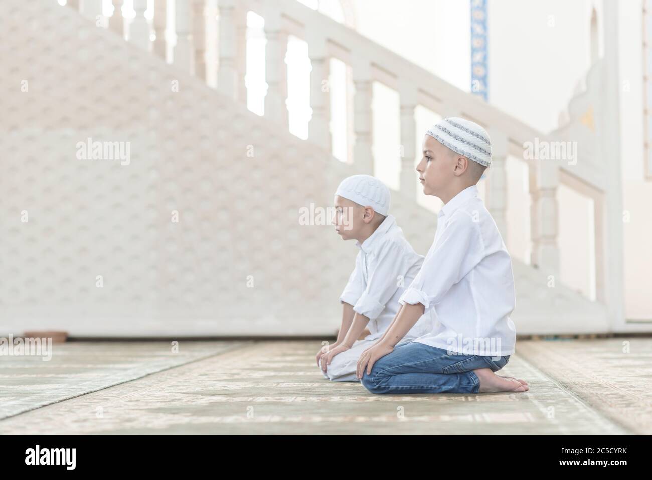 muslim boy prays in a mosque Stock Photo - Alamy