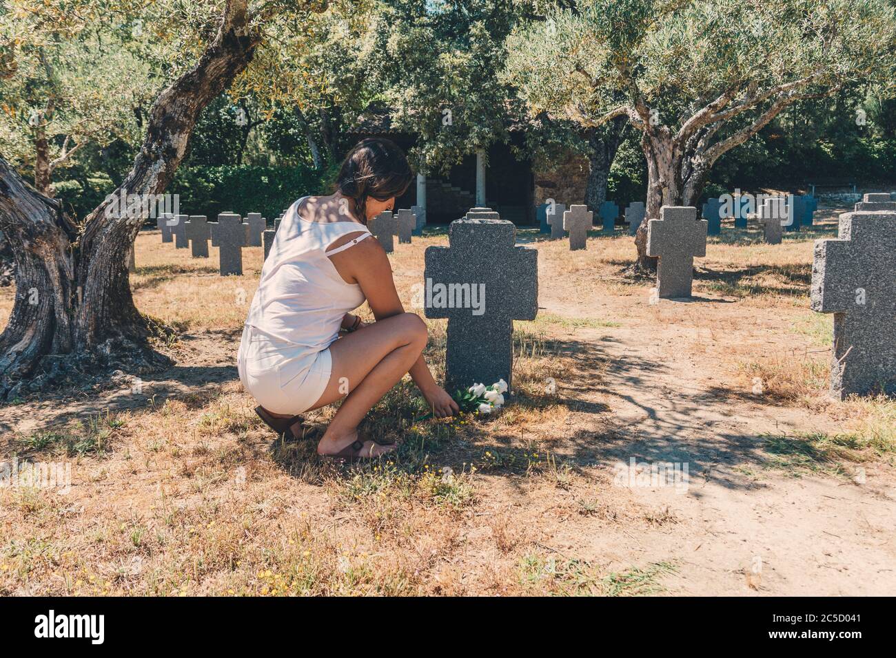 Sad Girl In Cemetery Grave High Resolution Stock Photography and Images ...