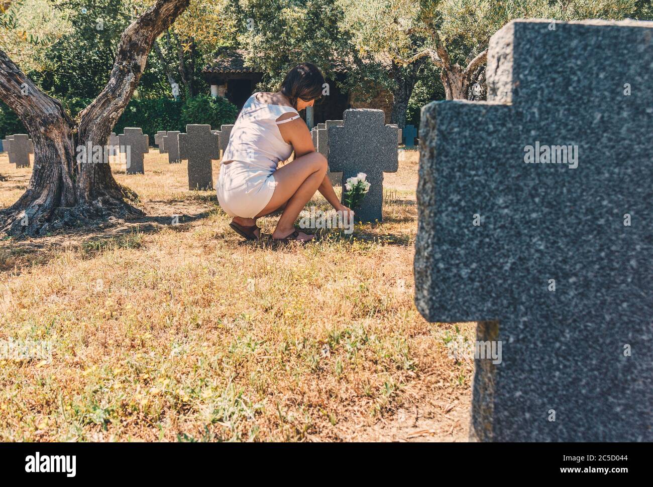 Sad Girl In Cemetery Grave High Resolution Stock Photography and Images ...