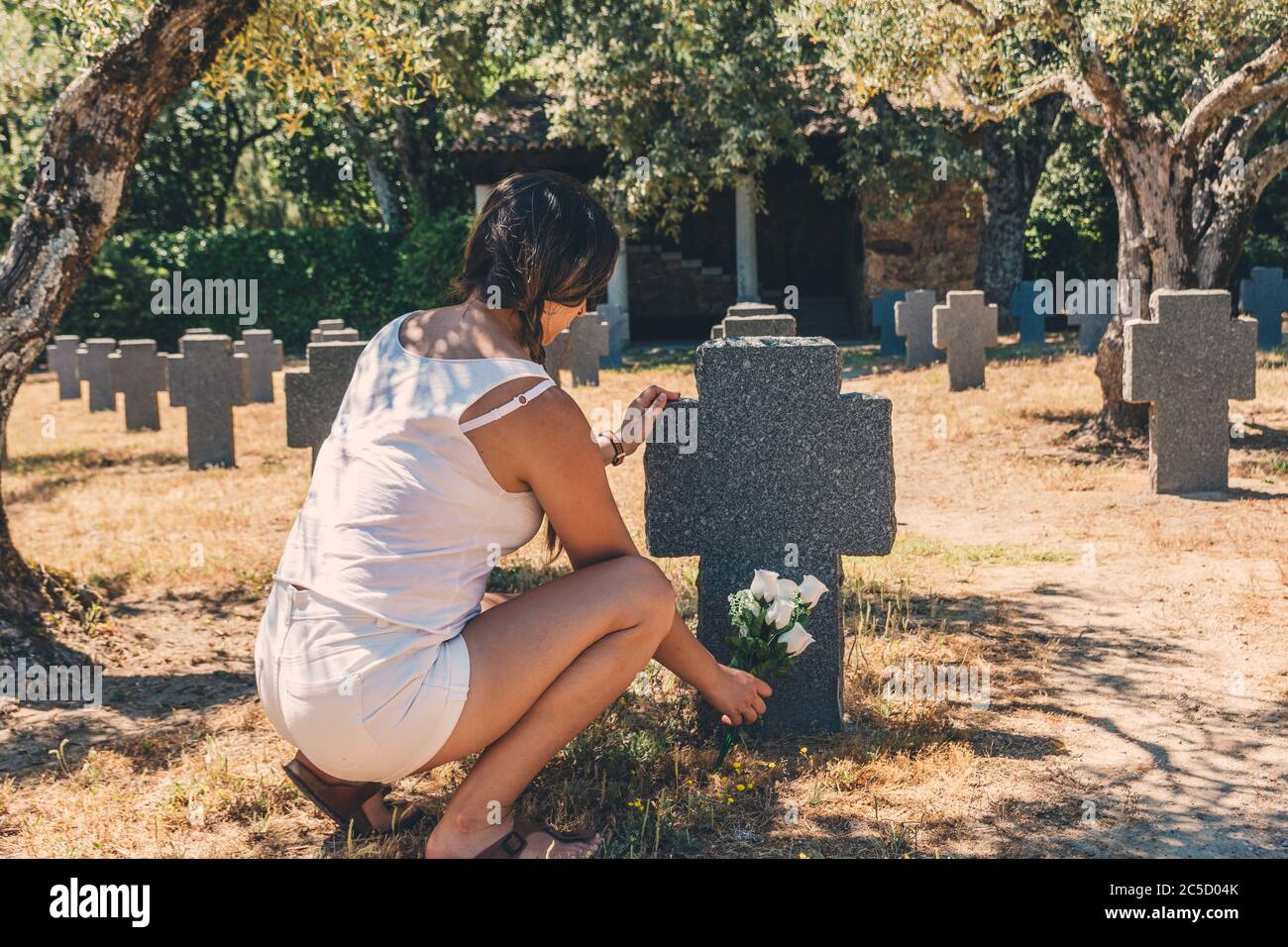 Sad Girl In Cemetery Grave High Resolution Stock Photography and Images ...