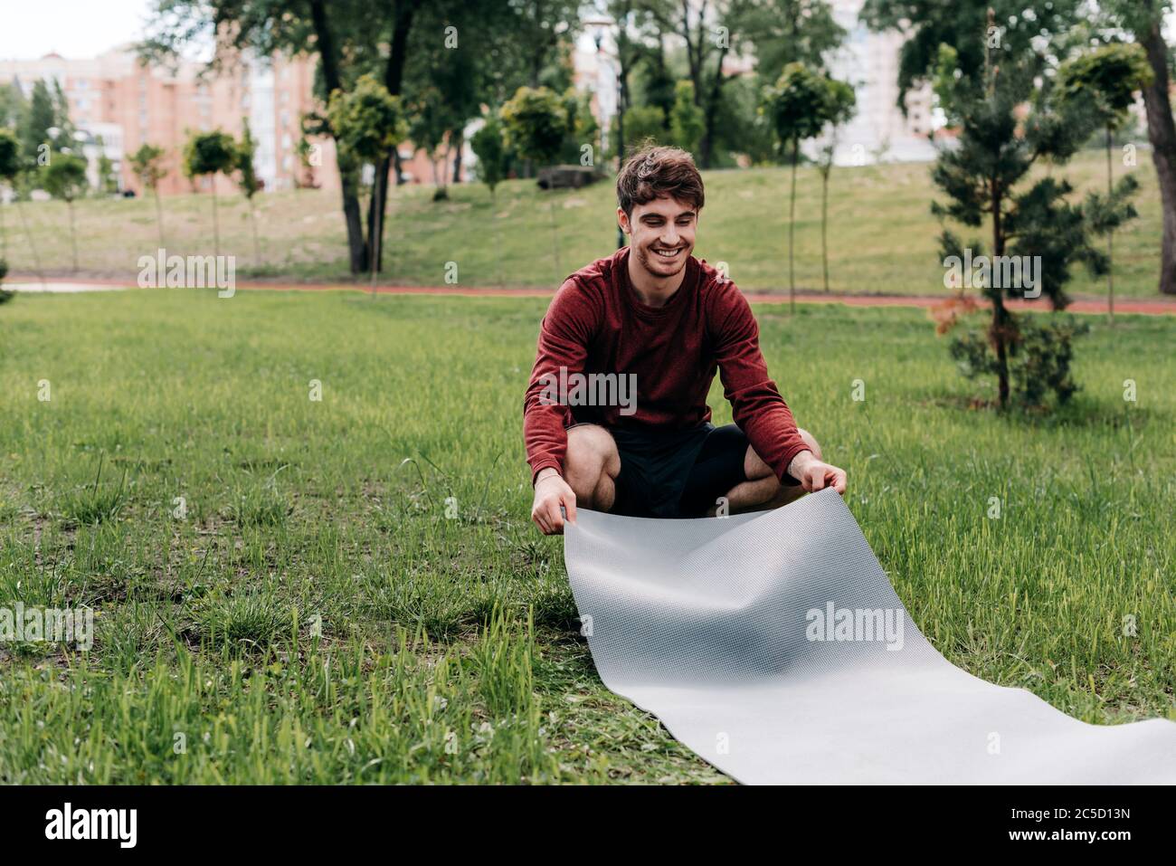 Smiling sportsman laying one hi-res stock photography and images - Alamy