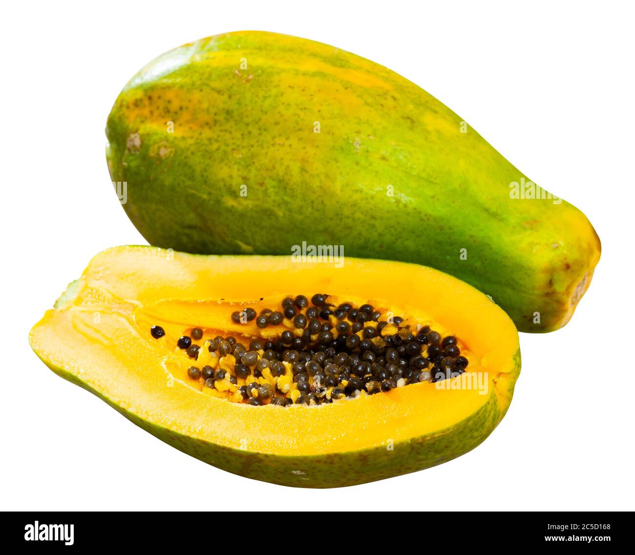 Fresh ripe papaya cut in half with juicy orange flesh and black seeds ...