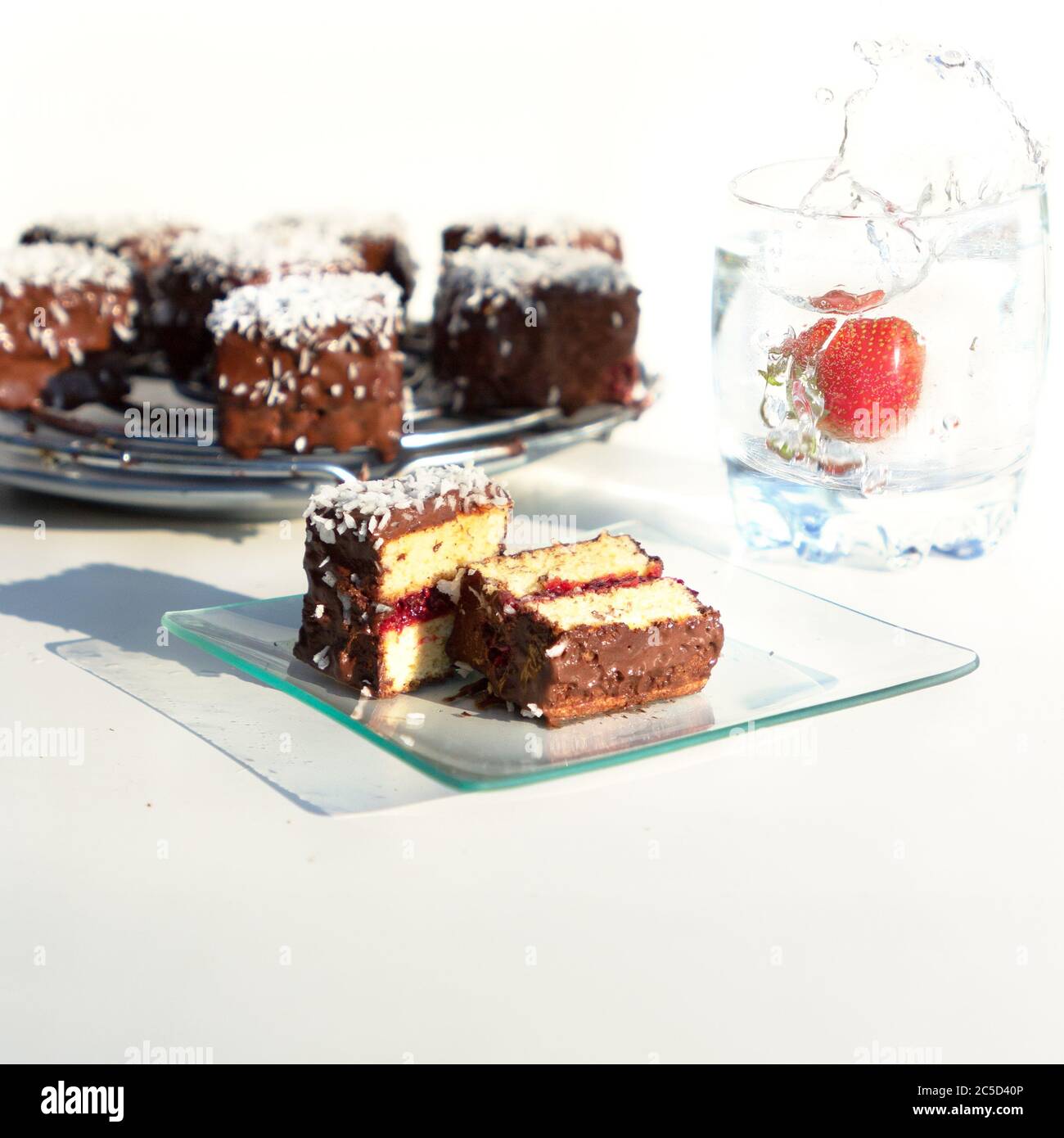 Traditional Australian lamington cakes with strawberry jam, chocolate ...