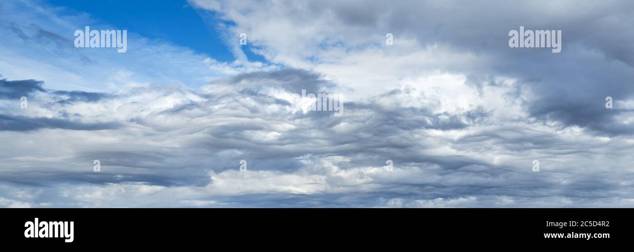 Clouds in the overcast sky view. Climate, environment and weather ...