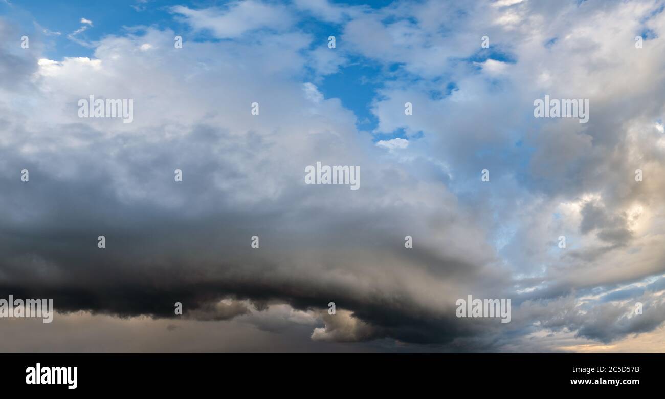Dramatic cloudy sky with circular thunderstorm cloud. Natural weather ...
