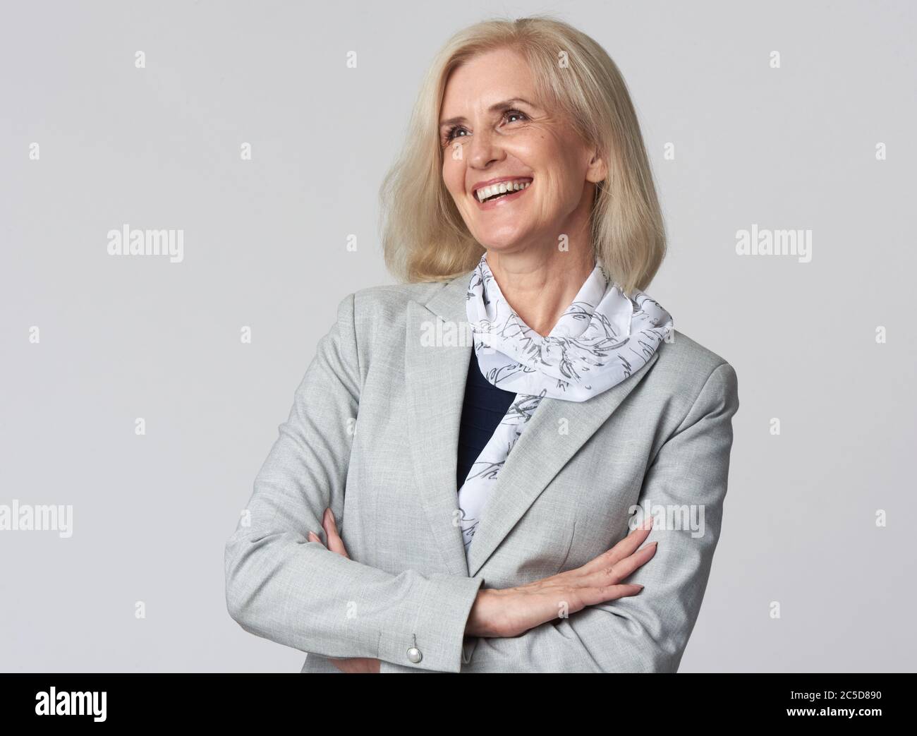 Female manager on grey hi-res stock photography and images - Alamy