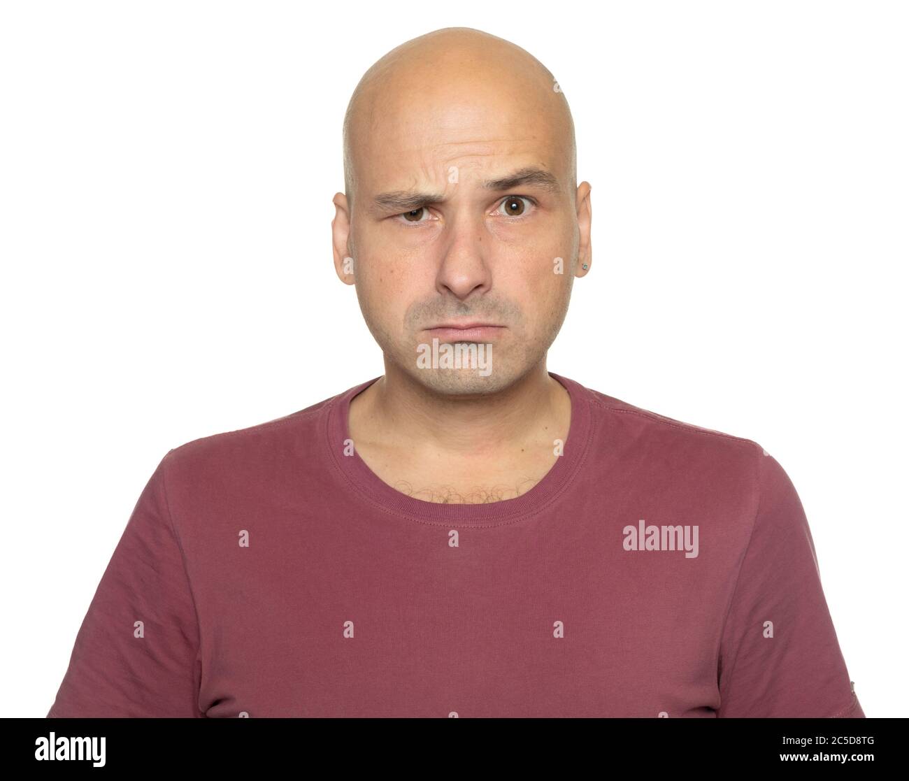 Bald man raised his eyebrow isolated on white background Stock Photo ...