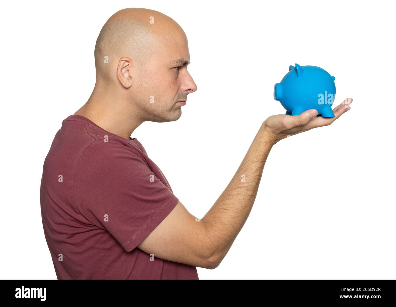Angry man looking at piggy bank and asking where is the money. Isolated ...