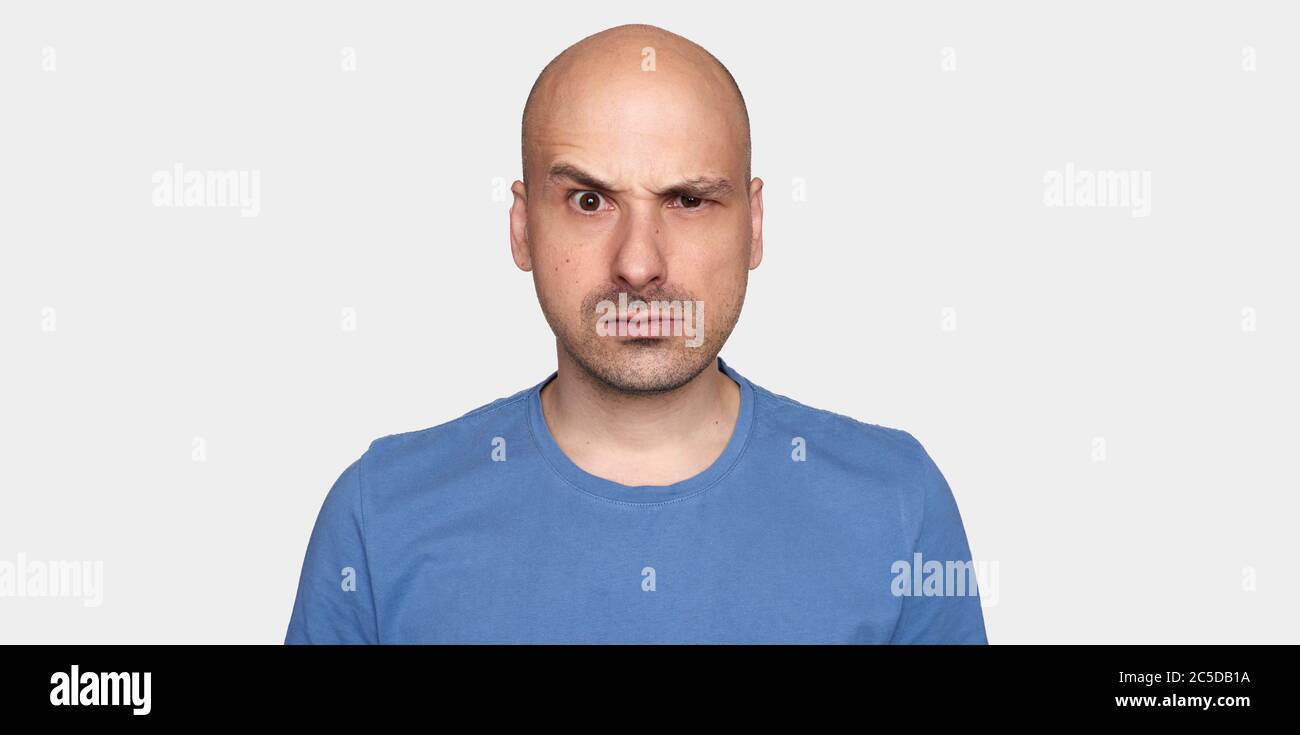 Angry bald guy hi-res stock photography and images - Alamy