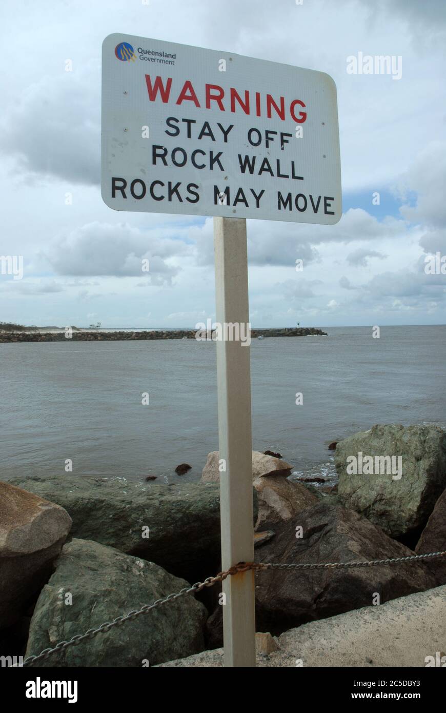 Warning Stay Off Rock Wall Rocks May Move sign, The Spit beach, Surfers ...