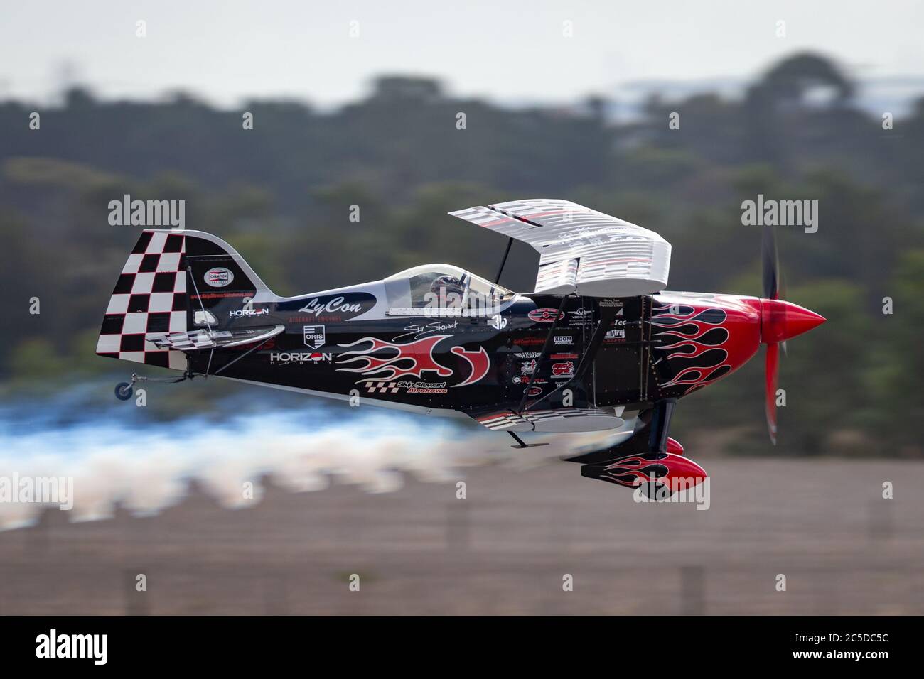 Aerobatic pilot Skip Stewart flying his highly modified Pitts S-2S ...