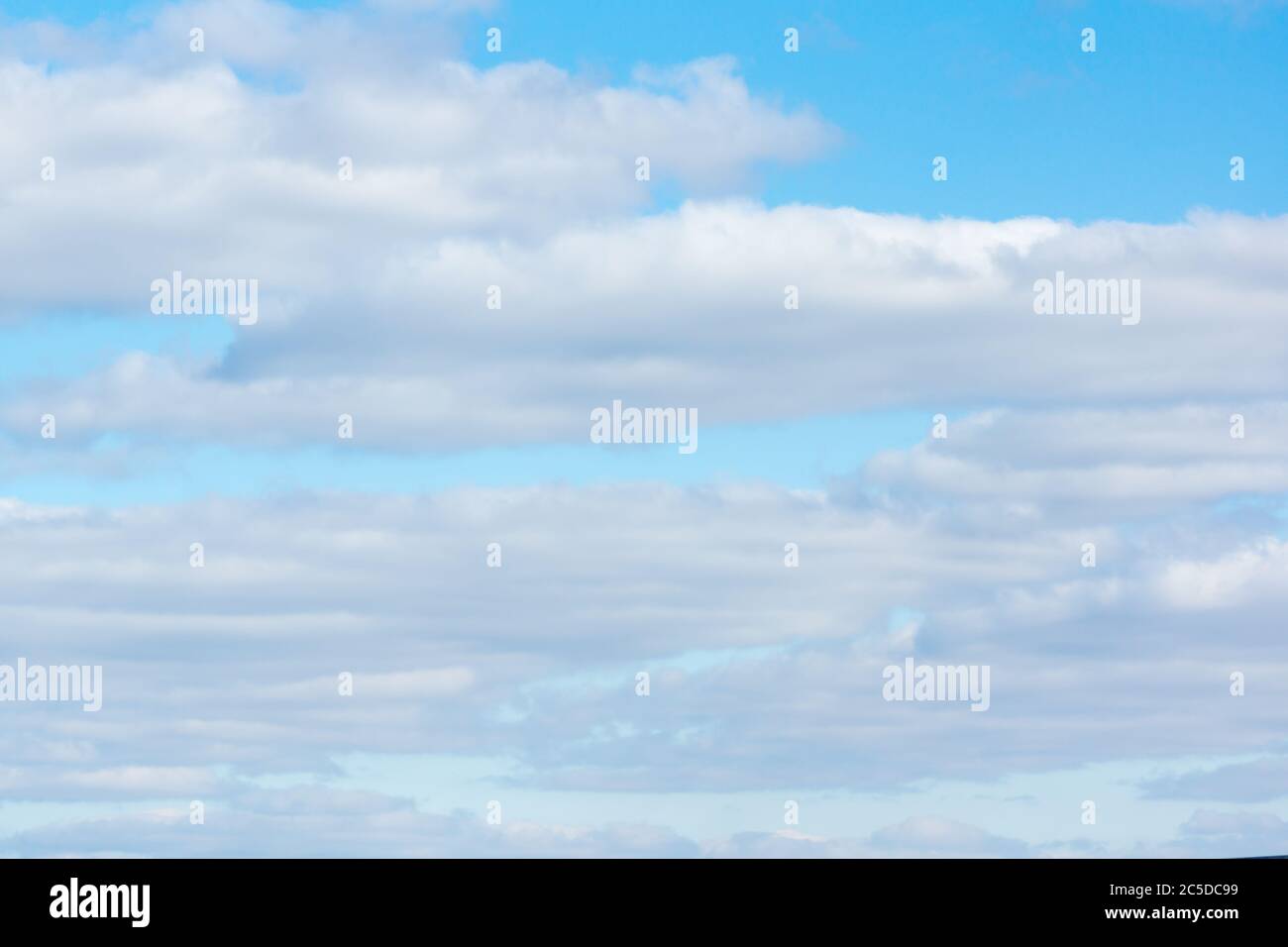 blue sky with flying white light clouds Stock Photo - Alamy