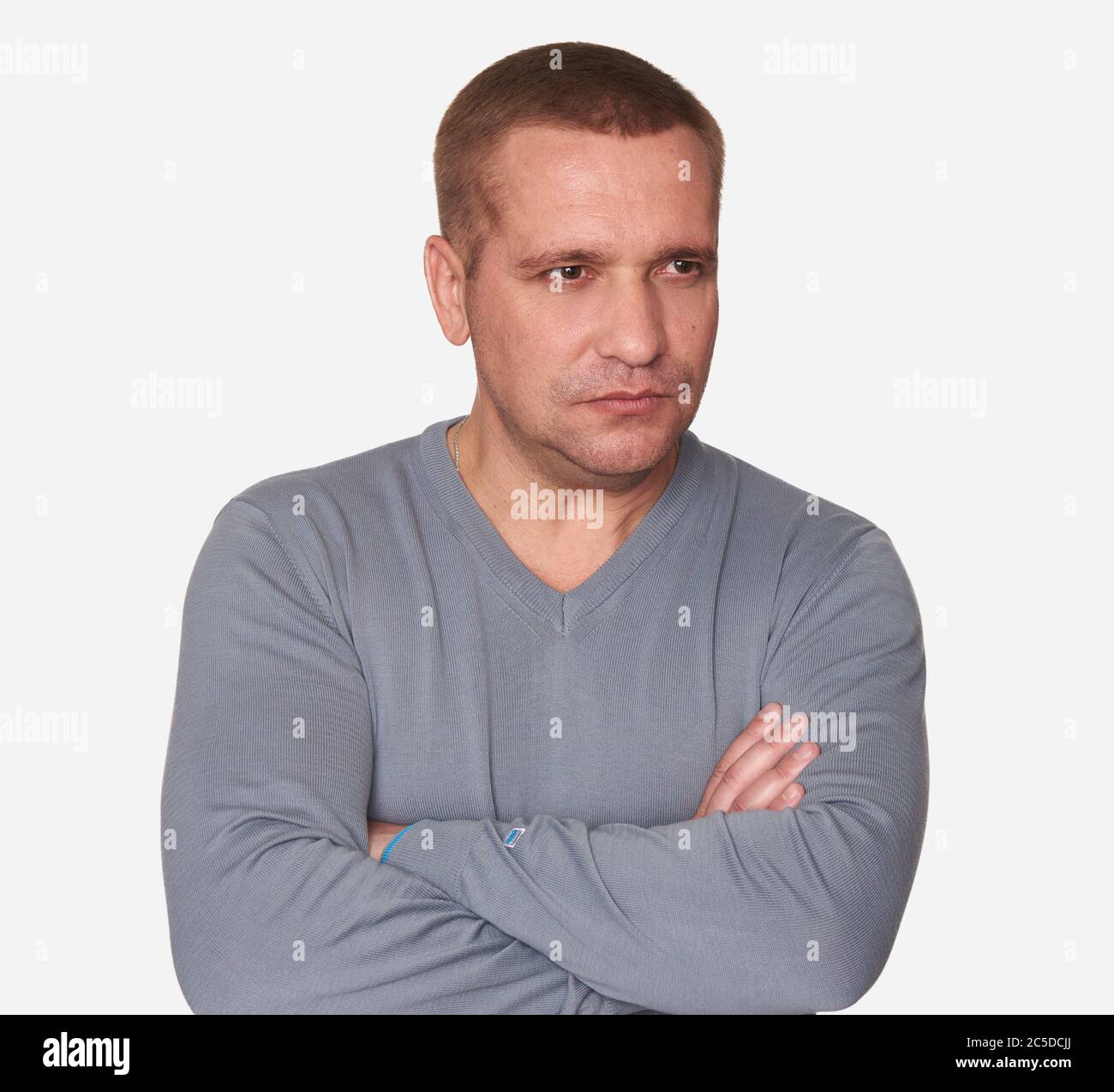 portrait of a serious middle adult man isolated on white background ...