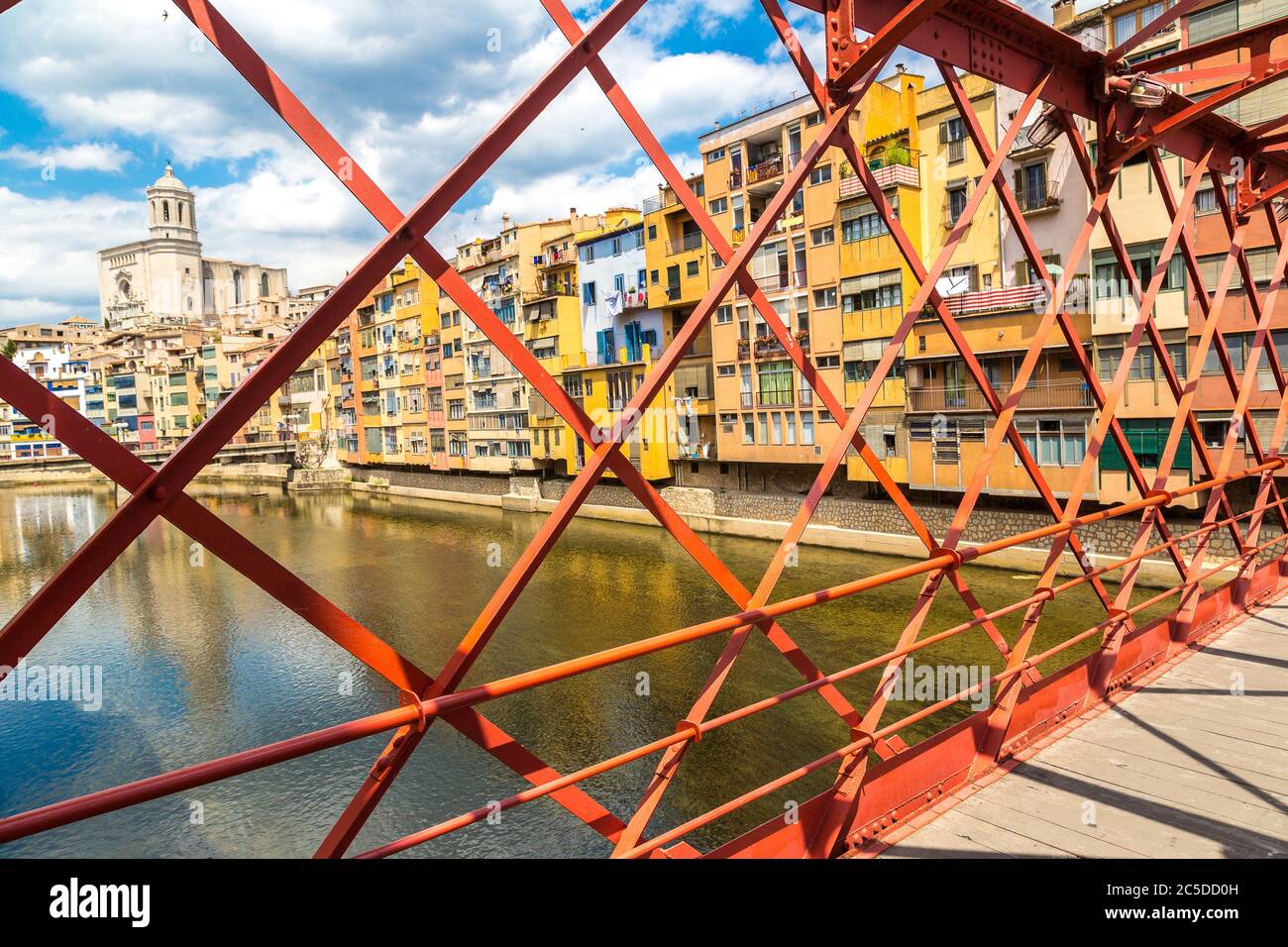 Red iron bridge - Eiffel bridge in Girona, in a beautiful summer day ...