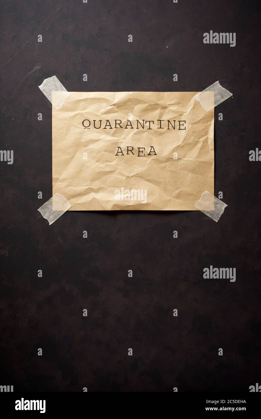Quarantine area text on a wall Stock Photo - Alamy