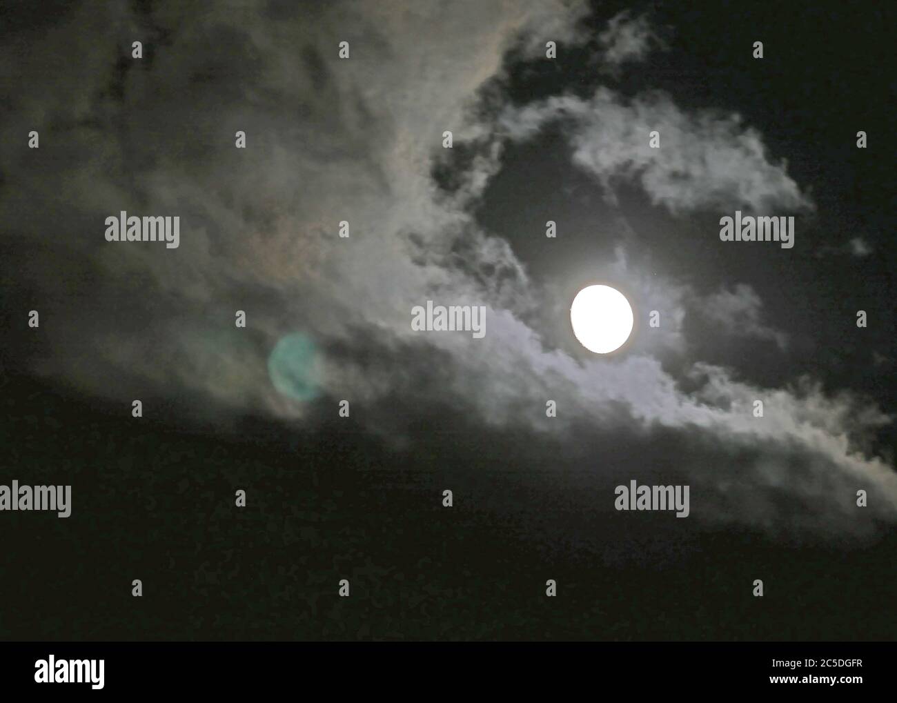 full moon light at night clouds sky Stock Photo - Alamy