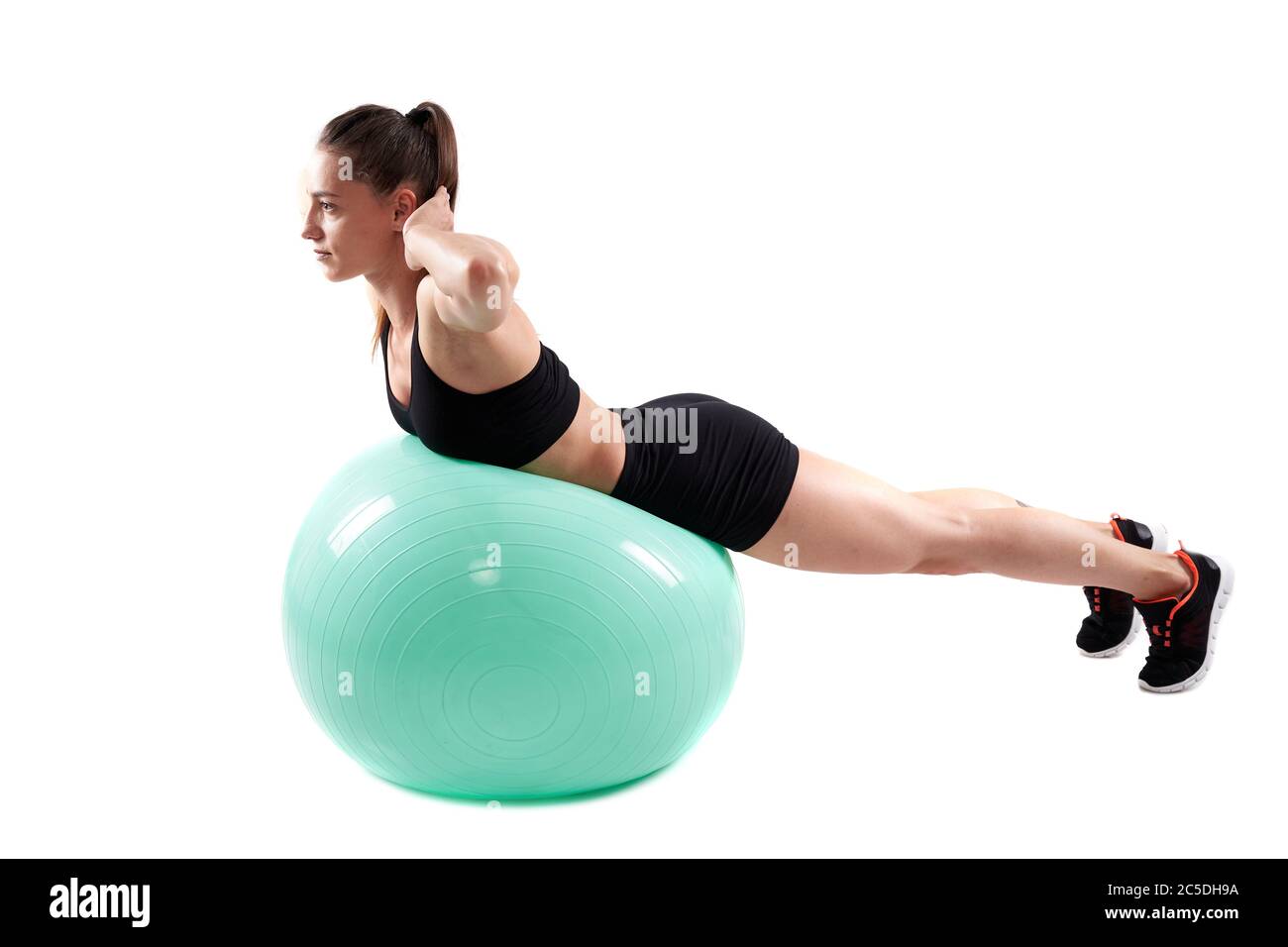 Fitness girl doing working out with gym ball Stock Photo - Alamy