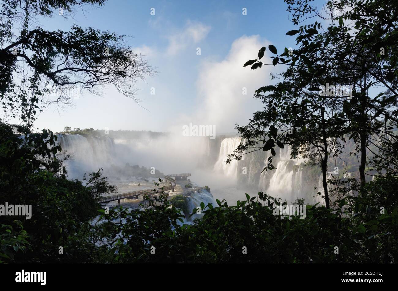 Plumes of water spray rising from Devils Throat waterfall at Iguacu ...