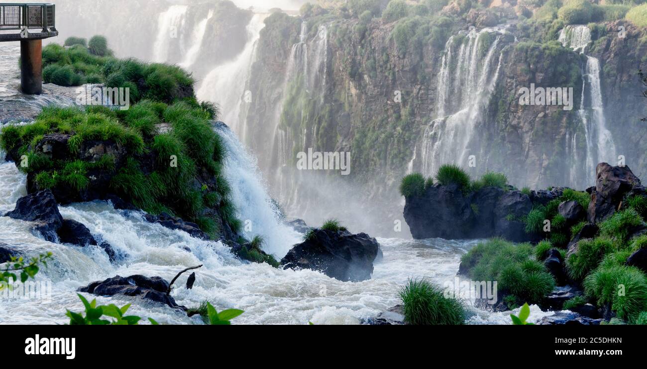 Torrents of water pouring over the edge of Devils Throat Waterfall at ...