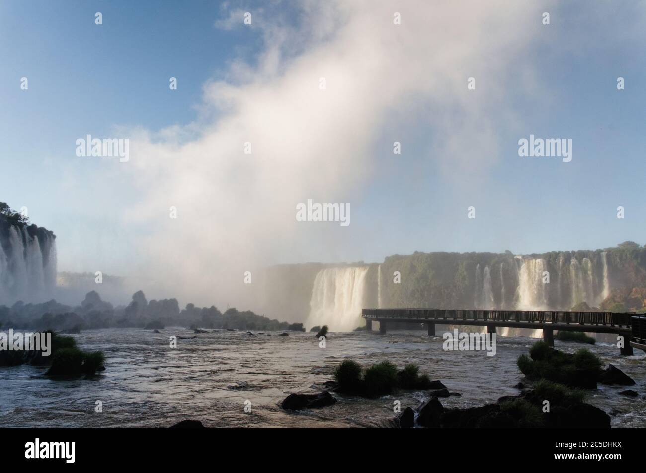 Plumes of water spray rising from Devils Throat waterfall over the ...