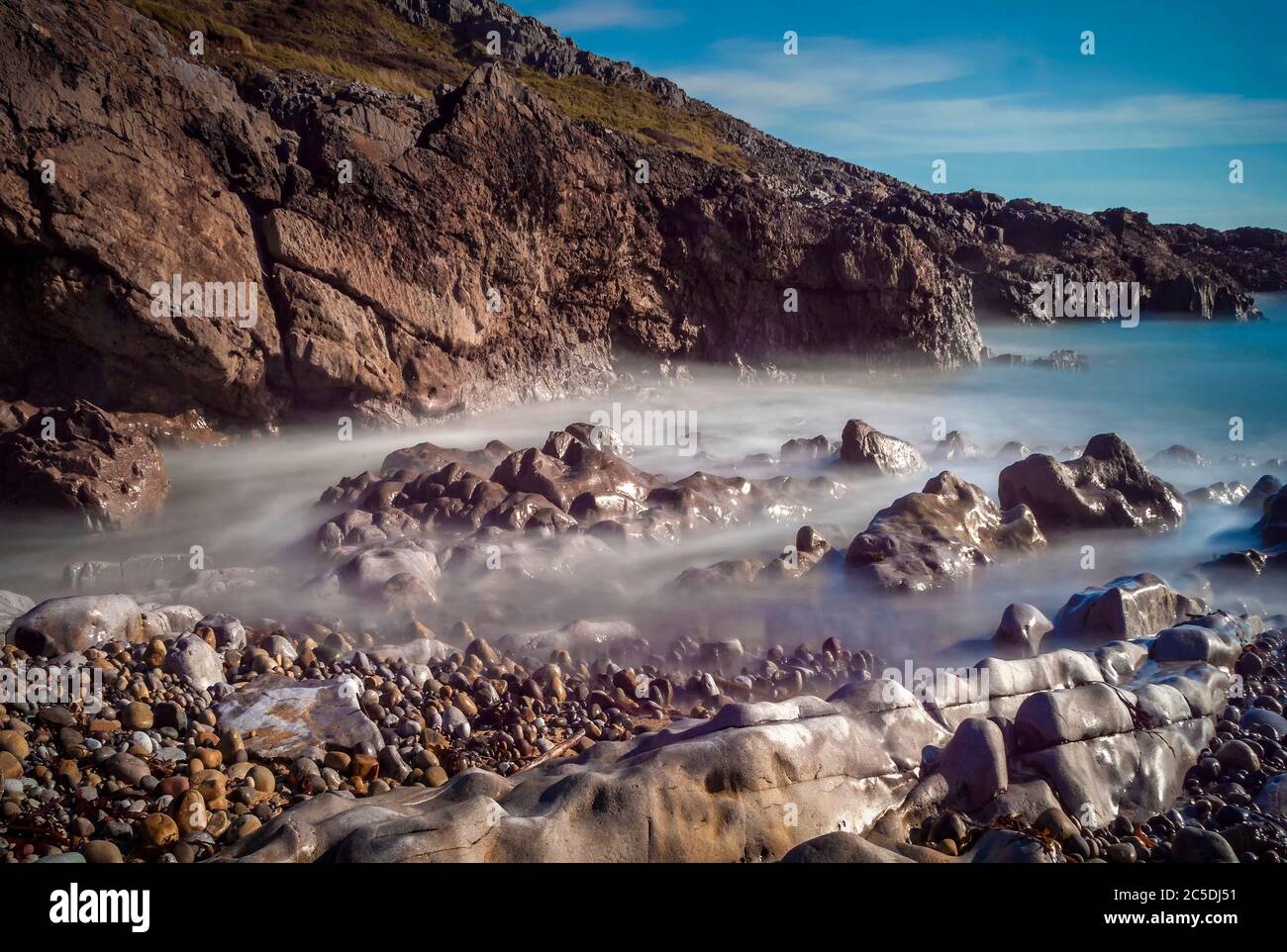 Bracelet Bay coastline travel destination with a long exposure at the ...