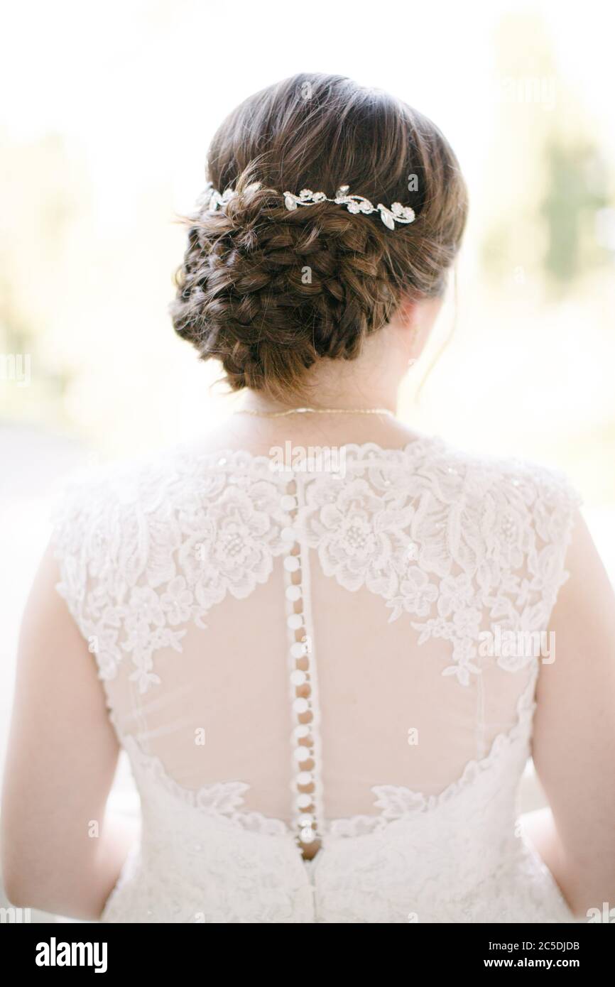 The bride posing with her back turned Stock Photo - Alamy