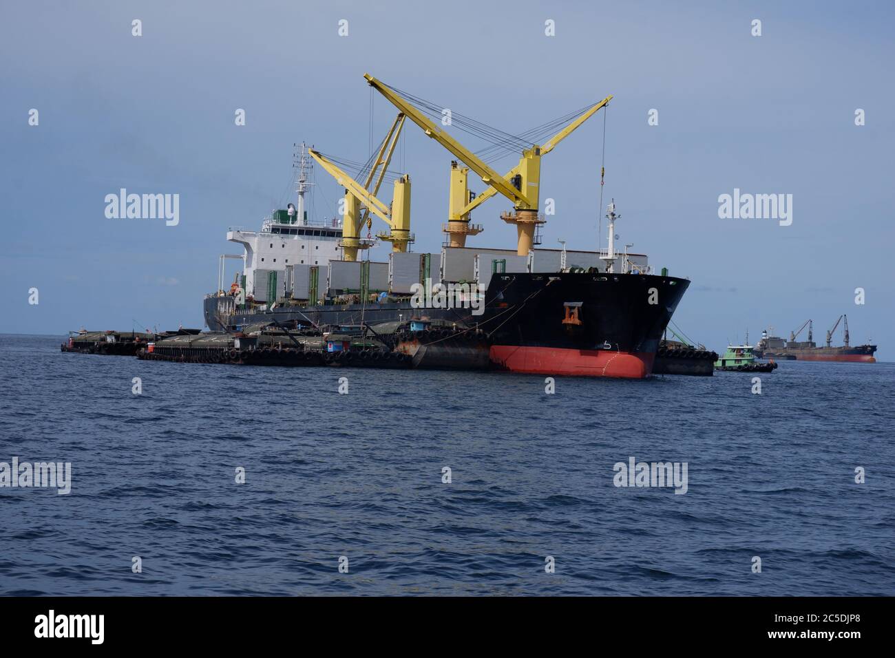 Sand carrier boat in the sea Stock Photo - Alamy