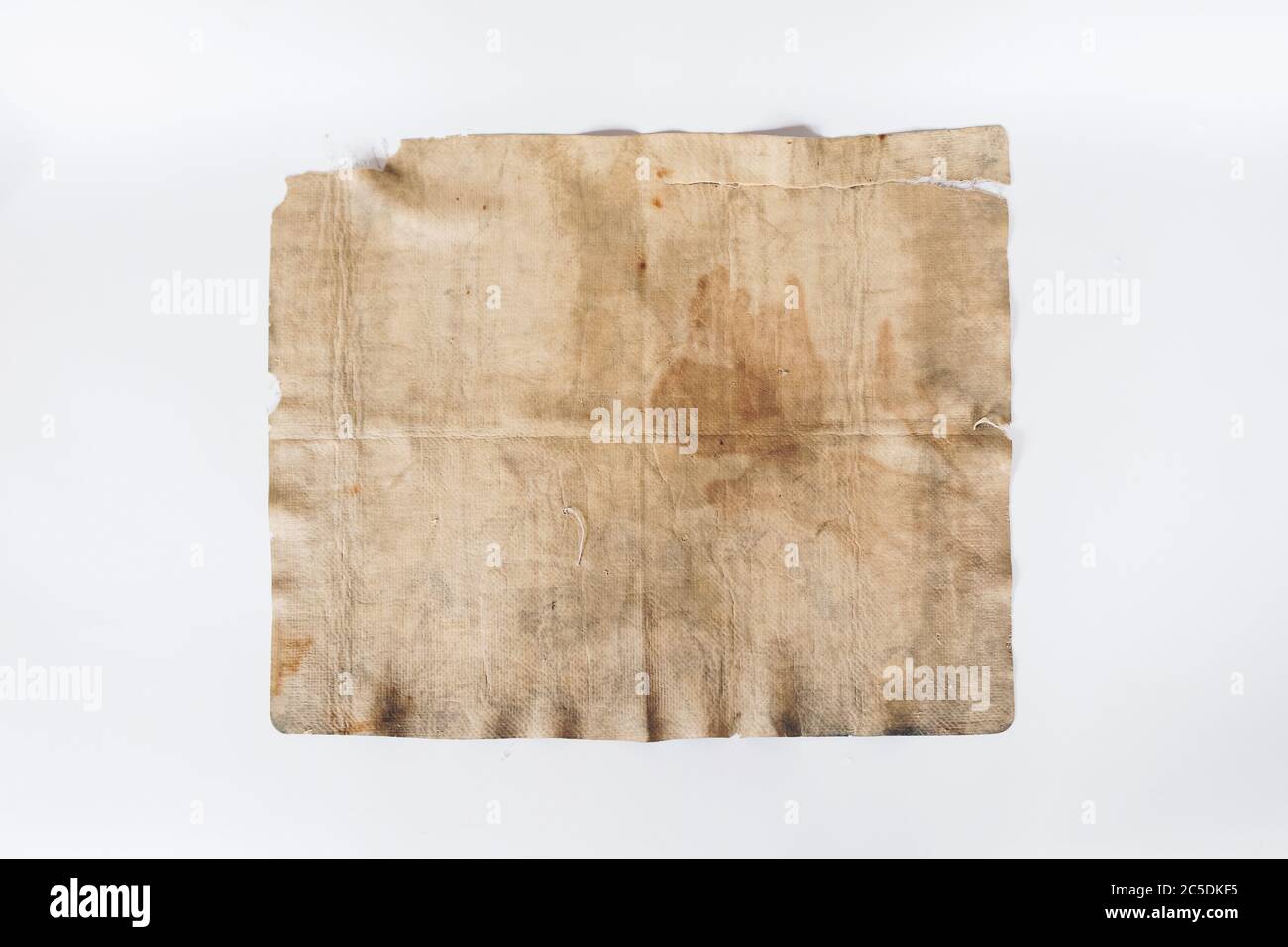 Dirty cleaning rag background texture in white background. Kanebo or ...
