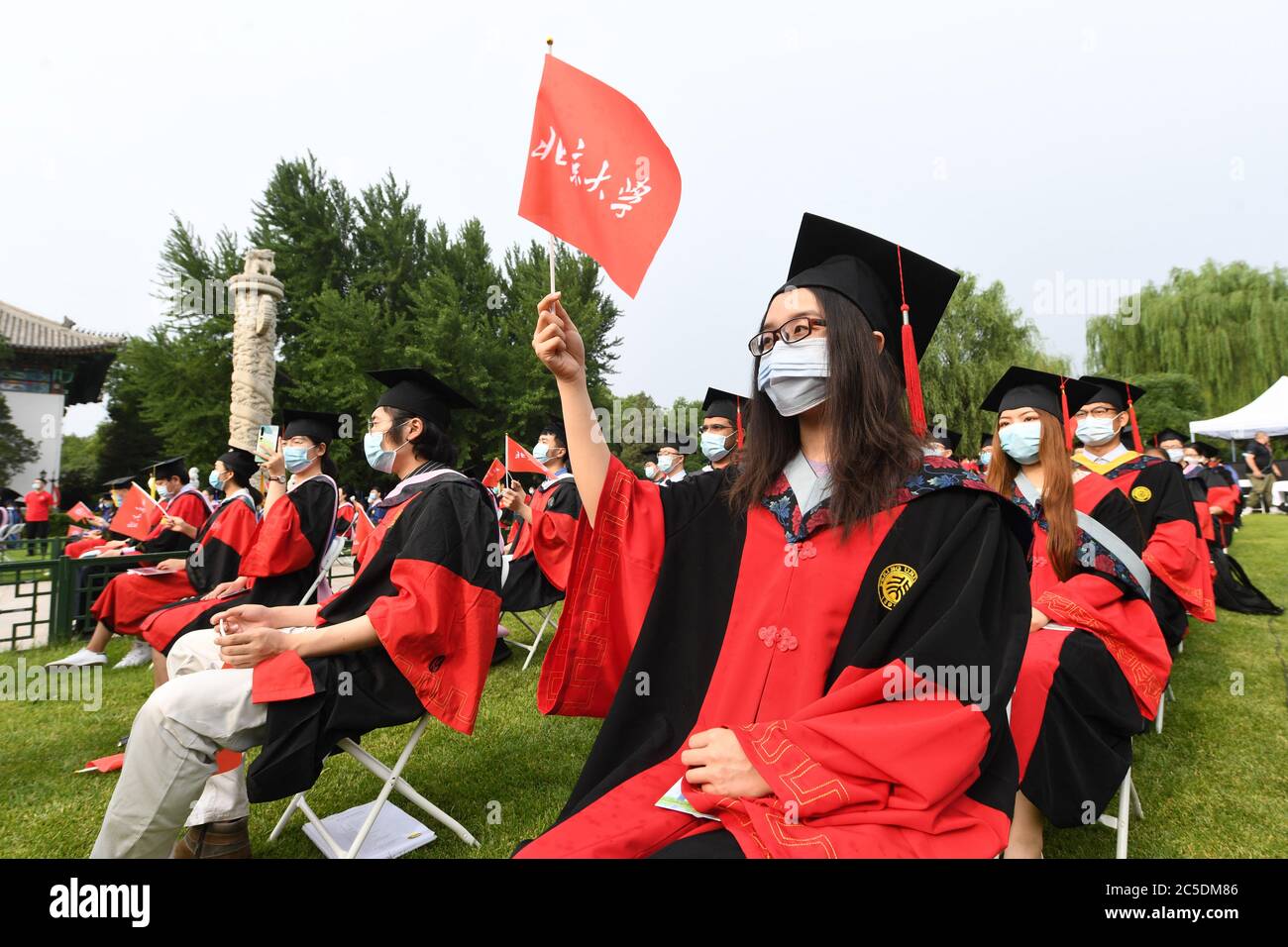 Beijing, China. 2nd July, 2020. Graduates attend the commencement ...