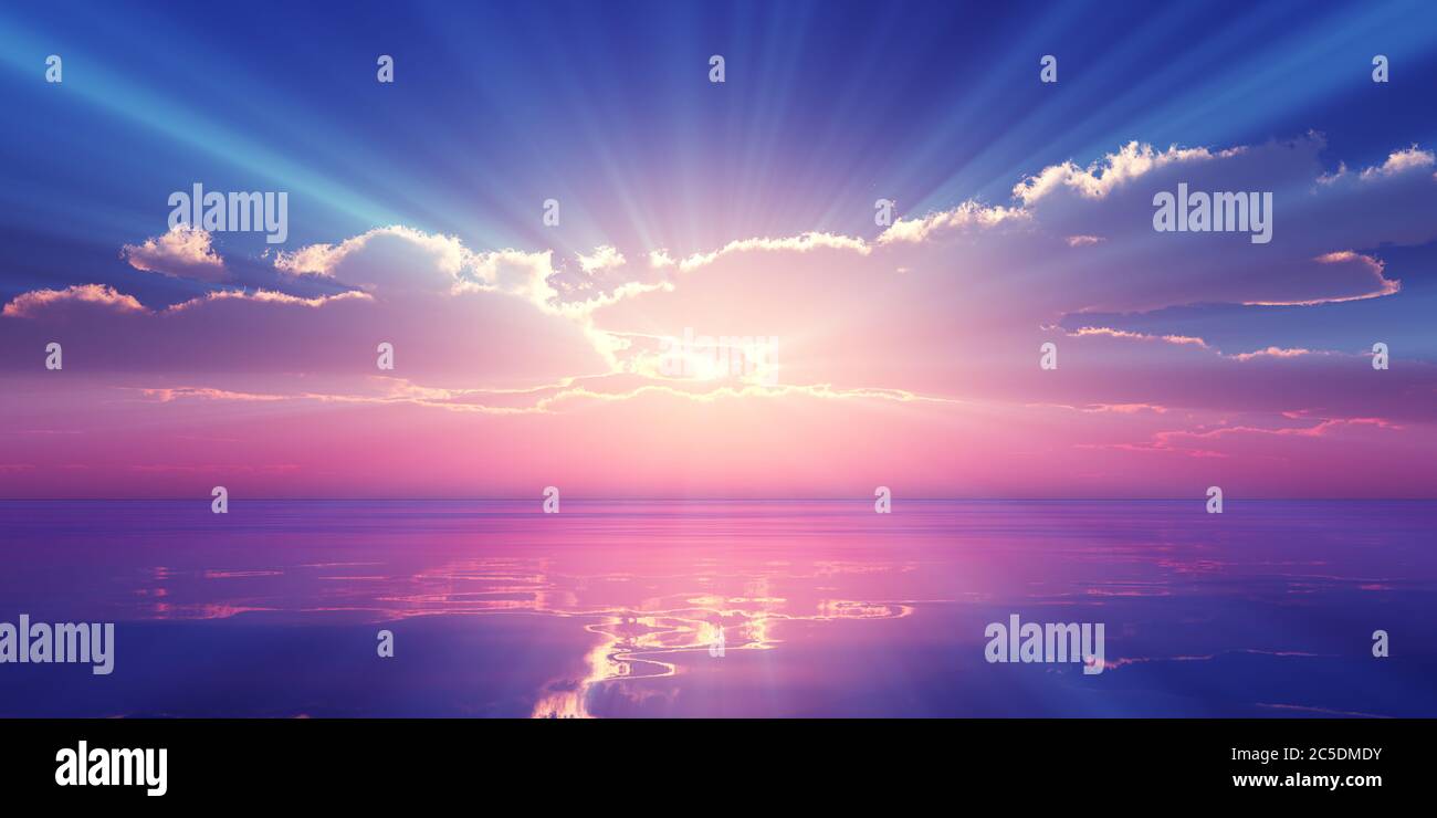 Beautify sunset over sea, sun god ray light Stock Photo - Alamy