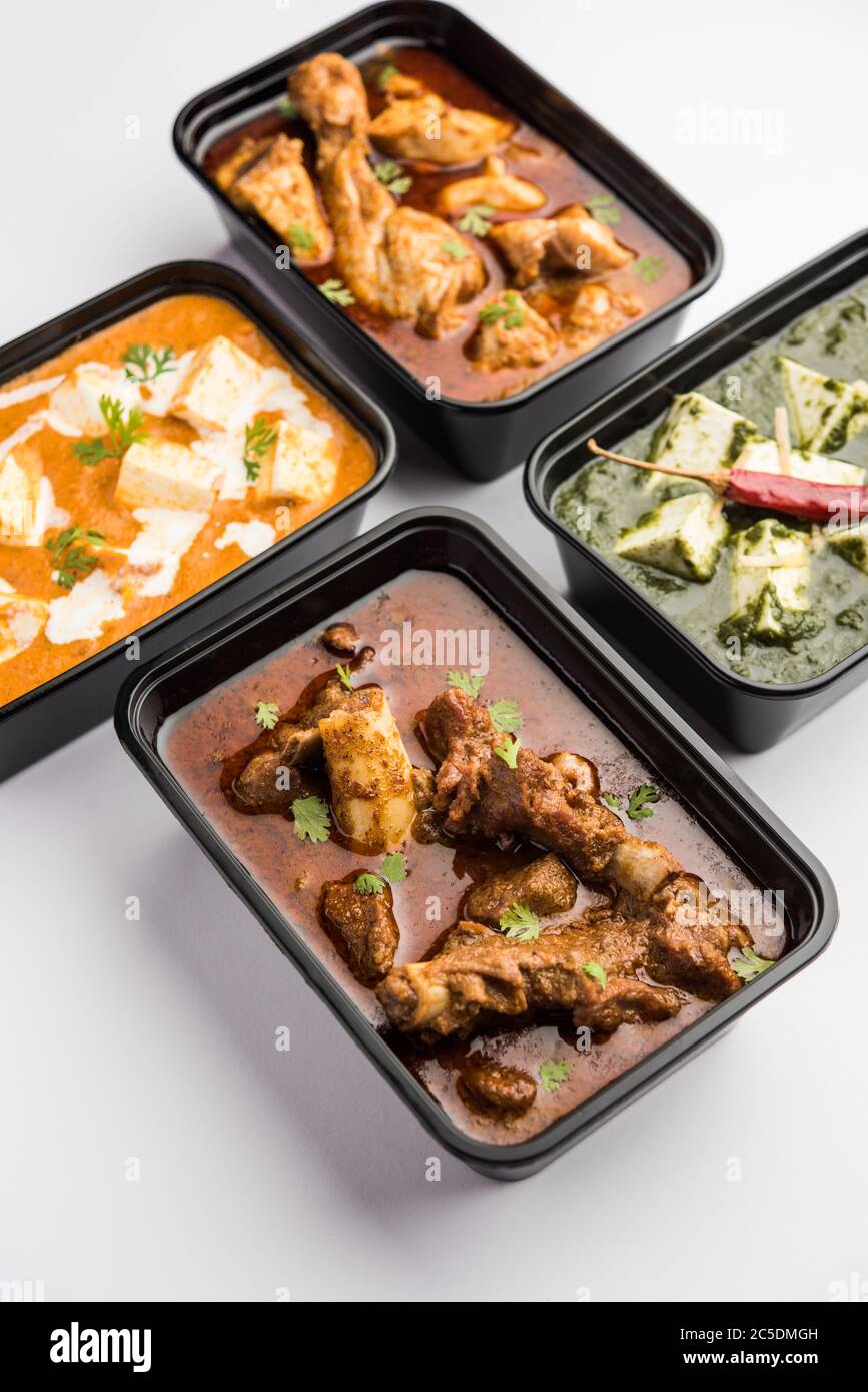 Online Food delivery concept Indian paneer butter masala and palak ...