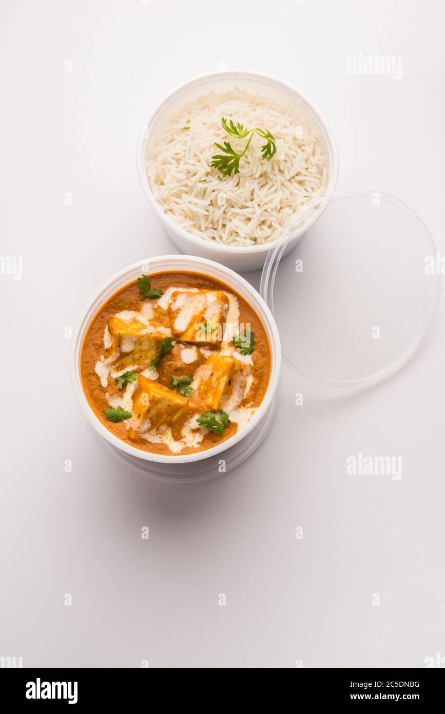 Paneer Butter Masala packed in plastic container or box, ready for home ...