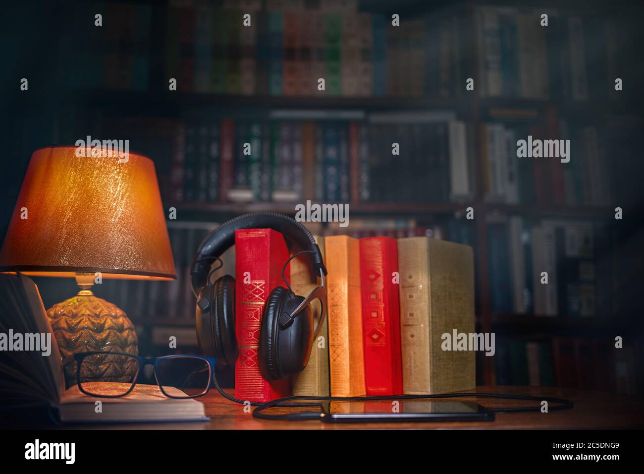 Pile of books a lamp on top hi-res stock photography and images - Alamy