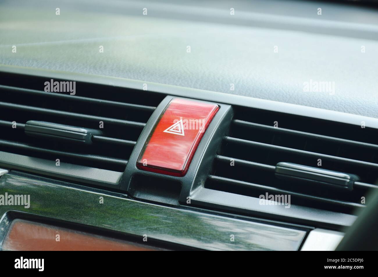 red button for open emergency light in car Stock Photo - Alamy