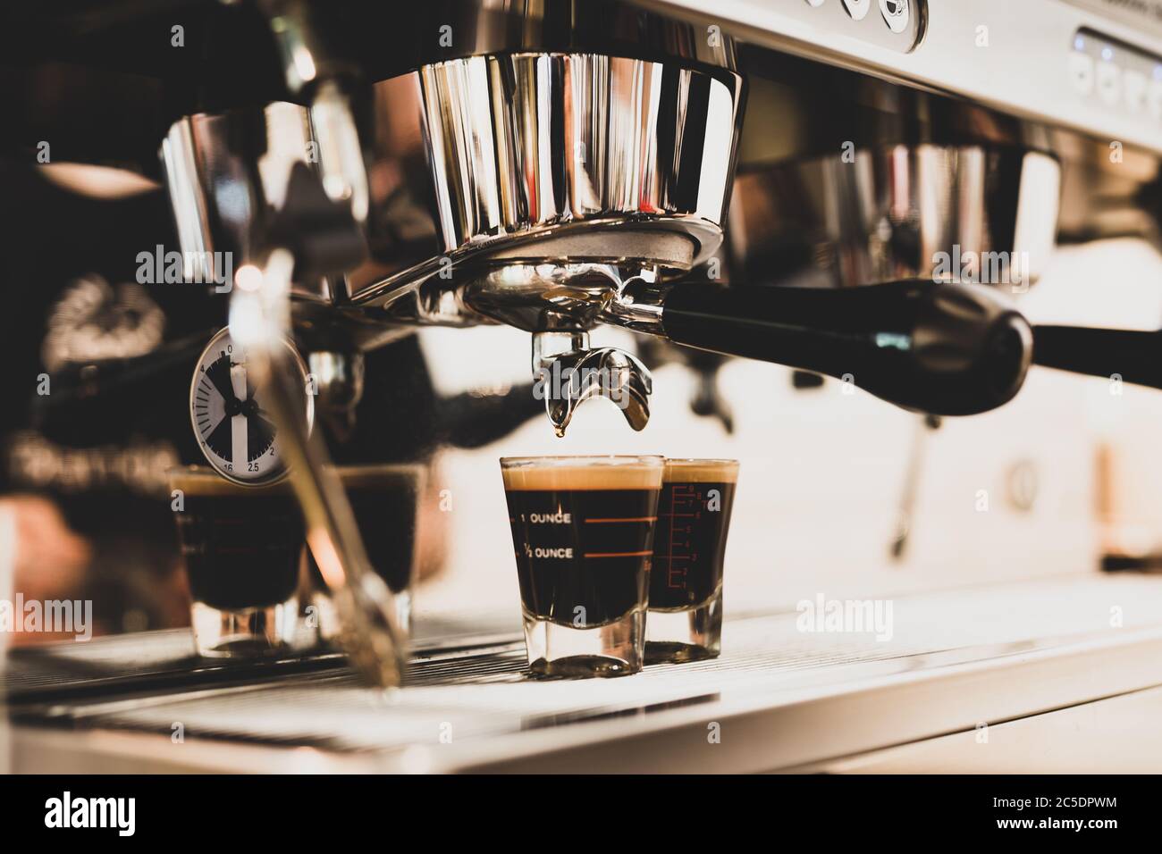 Brewing espresso into shot glass hi-res stock photography and images ...
