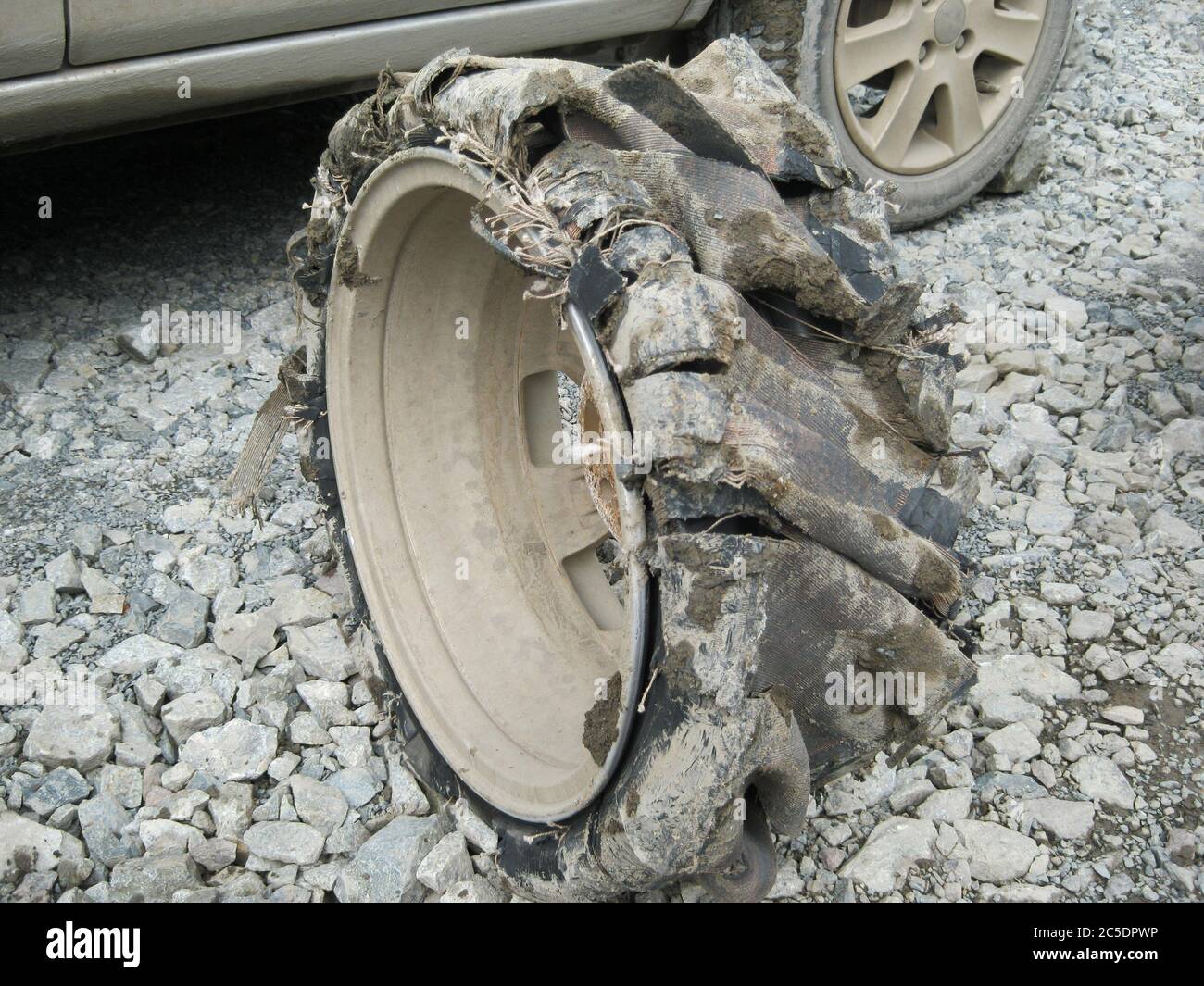 Rubber wheel punctured hi-res stock photography and images - Alamy