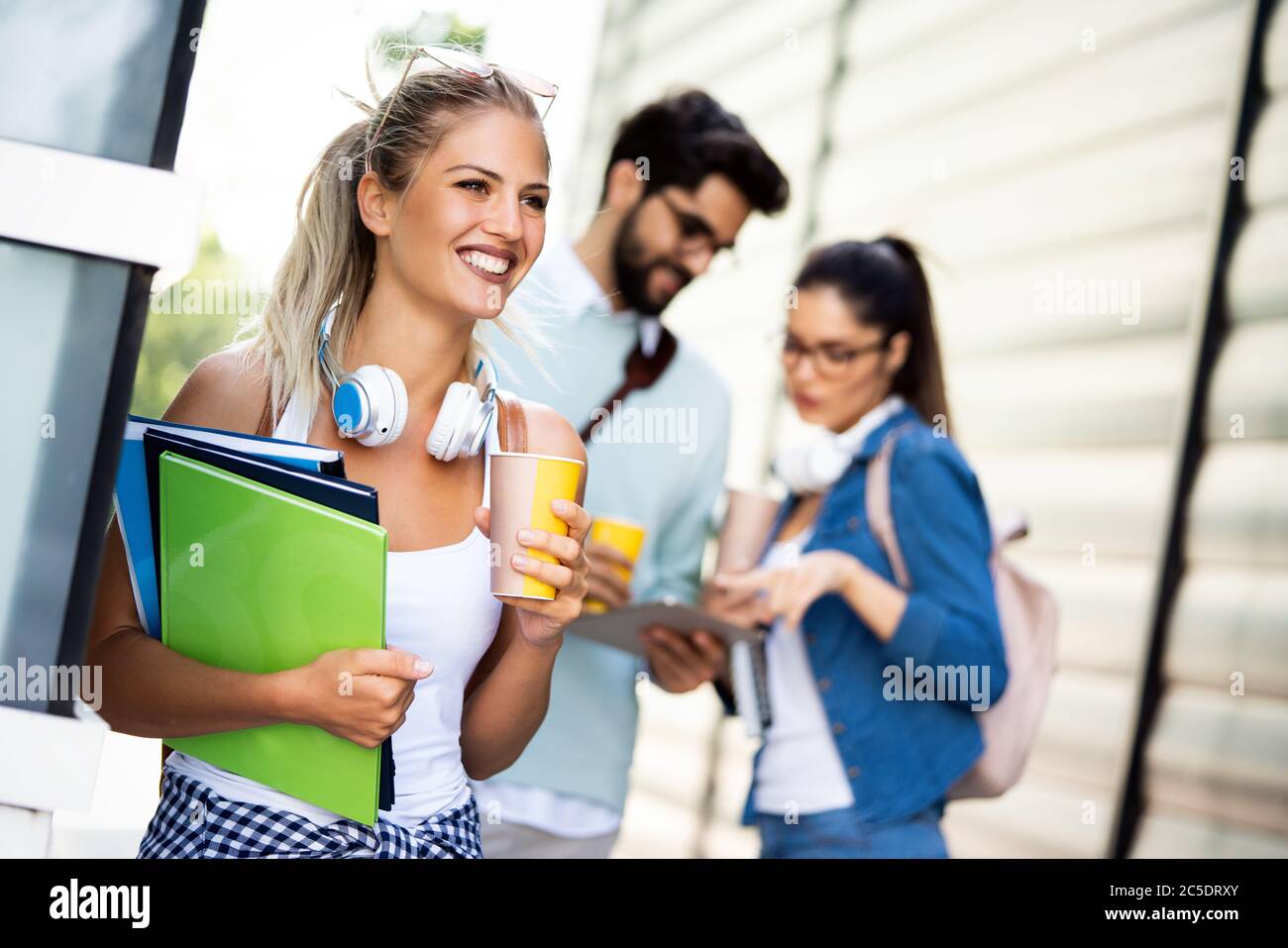 College students studying on university campus outdoor Stock Photo - Alamy