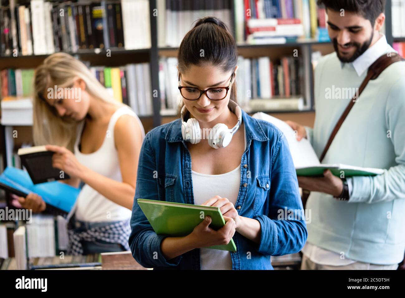 Education concept. University students preparing for exam, talking in ...