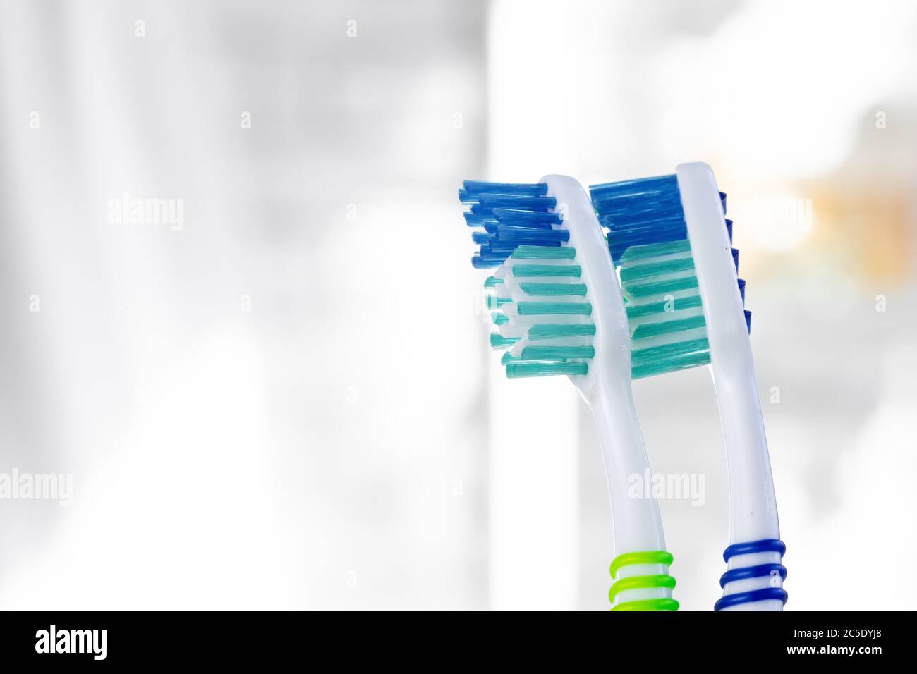 Close up photo of two new toothbrushes Stock Photo - Alamy