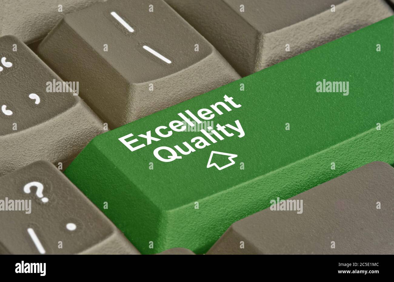 Keyboard with key for excellent quality Stock Photo - Alamy