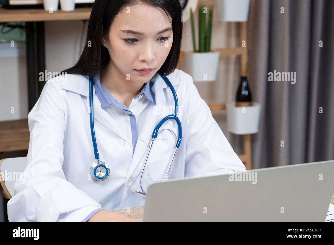 Asian female doctor video hi-res stock photography and images - Alamy