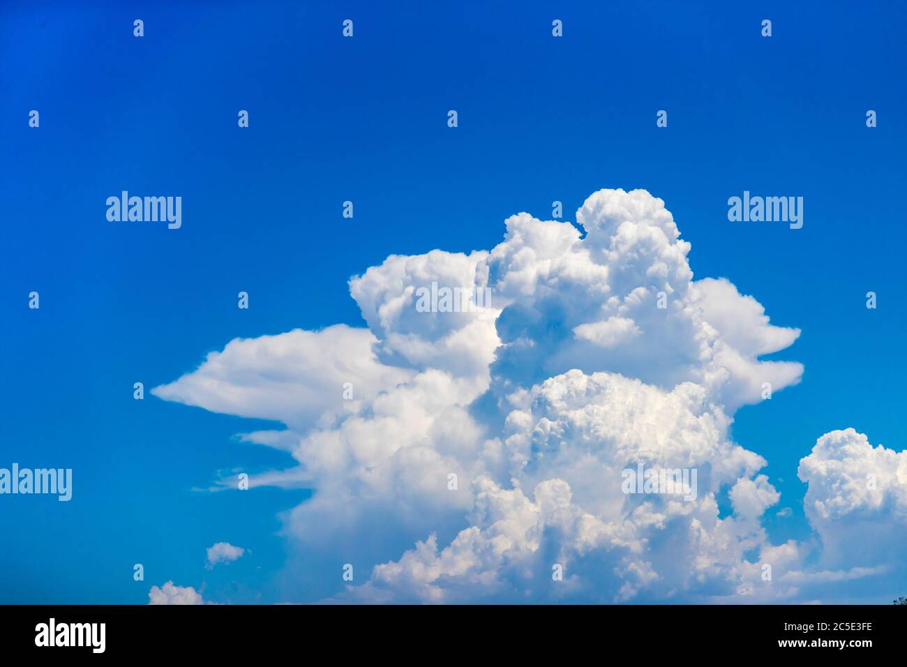 billowing white clouds Stock Photo - Alamy