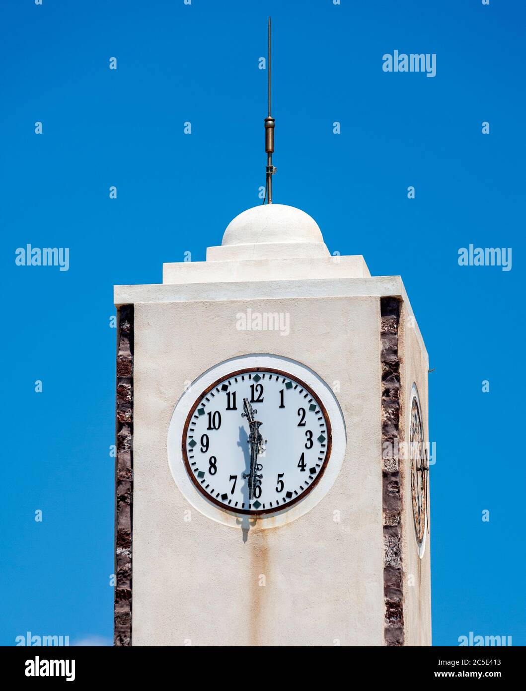 Santorini Greece. Old church clock tower with lightning conductor on ...